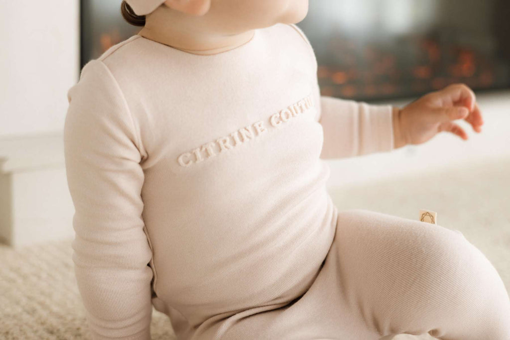 Citrine Logo Footie - Lavender – Citrine Layette Couture